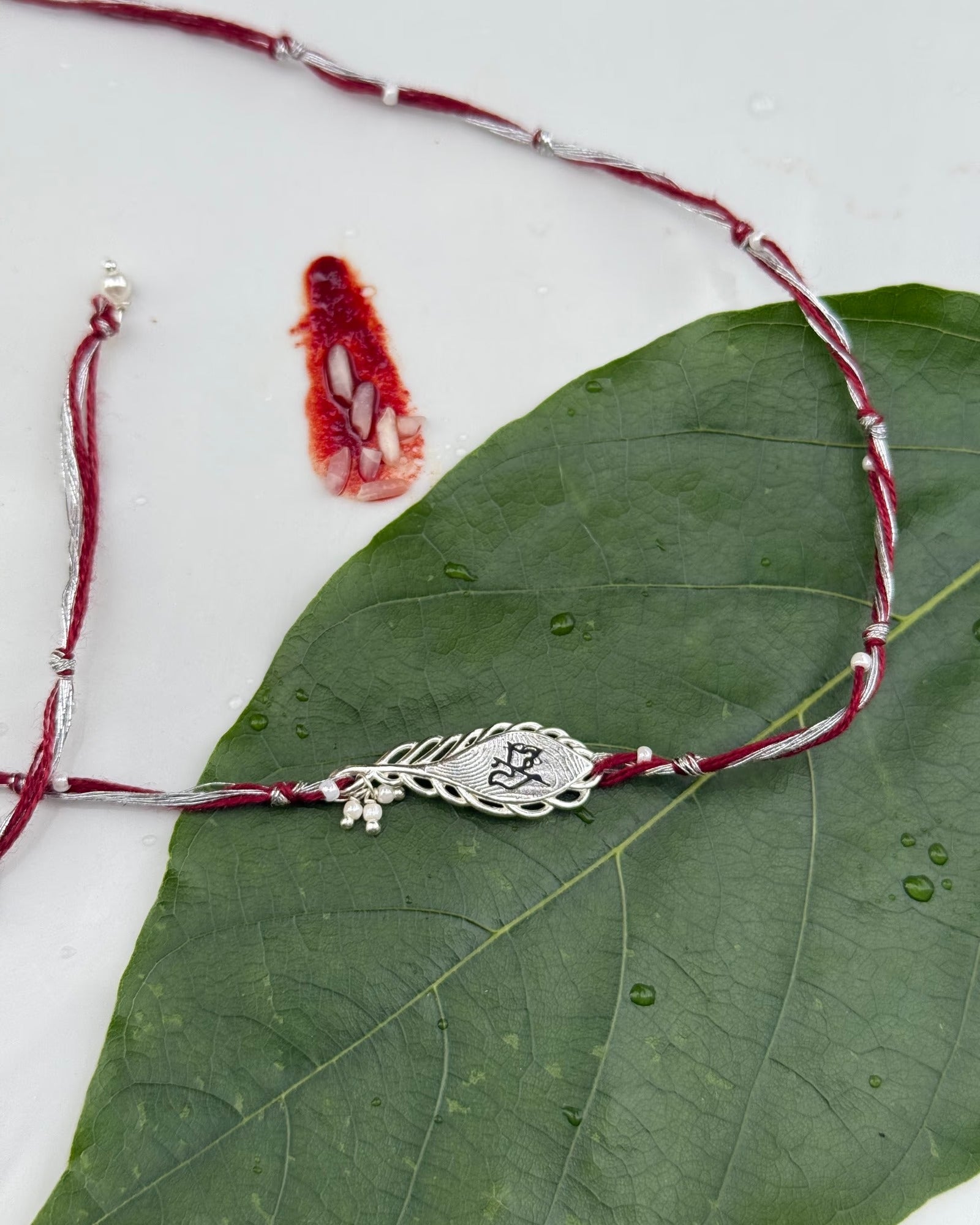 Shyam Pankhi Rakhi in Silver